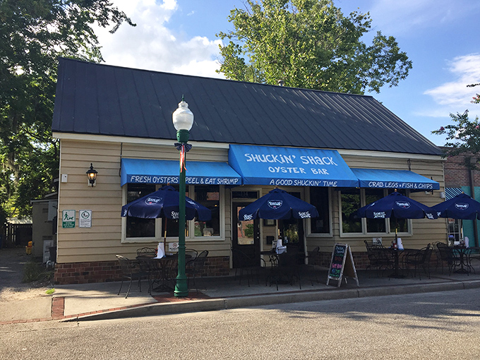 The blue awning promises "A GOOD SHUCKIN' TIME" – and folks, that's truth in advertising if I've ever seen it.