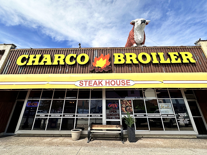 That iconic yellow awning and giant cow on the roof aren't just for show – they're beacons calling hungry Texans home to flavor paradise.