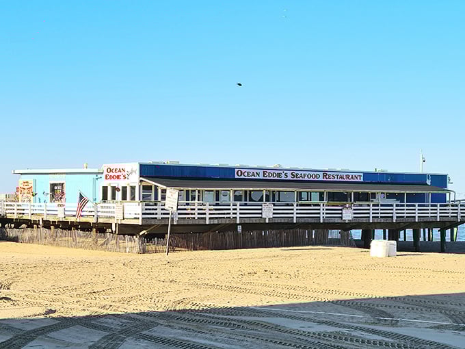 Perched on the pier like a weathered captain's quarters, Ocean Eddies waits patiently for hungry souls.