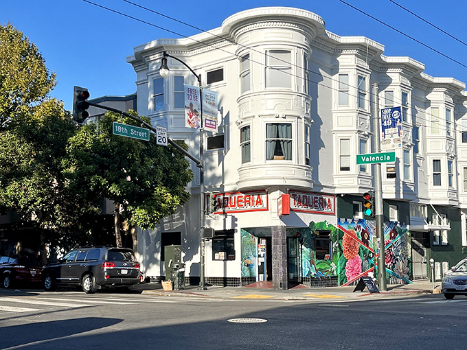 The vibrant mural outside El Buen Sabor isn't just decoration—it's a preview of the colorful flavors waiting inside this Mission District gem.