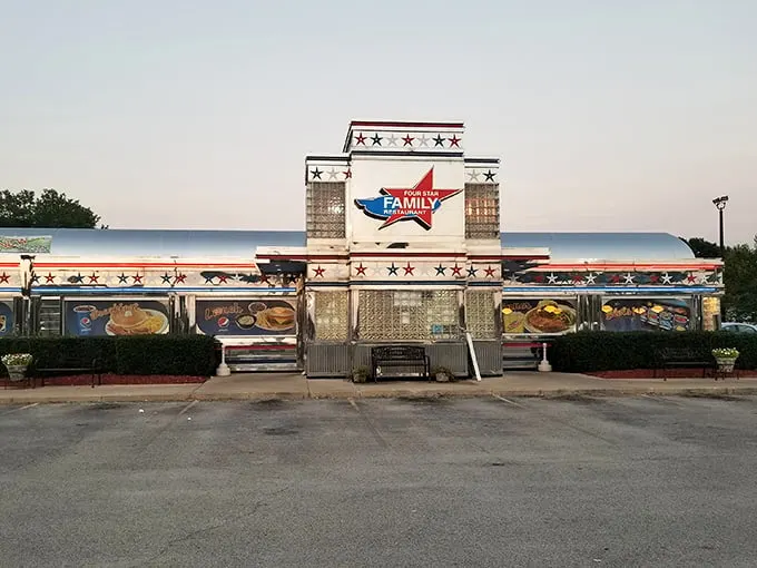 The patriotic facade of Four Star Family Restaurant gleams like a beacon for hungry travelers, promising all-American comfort in the heart of Mt. Zion.