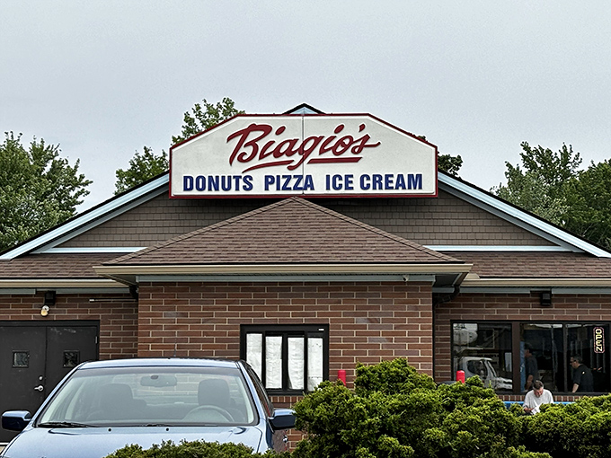 The sign says it all: donuts, pizza, and ice cream. It's like they read my diary and built a business around it.