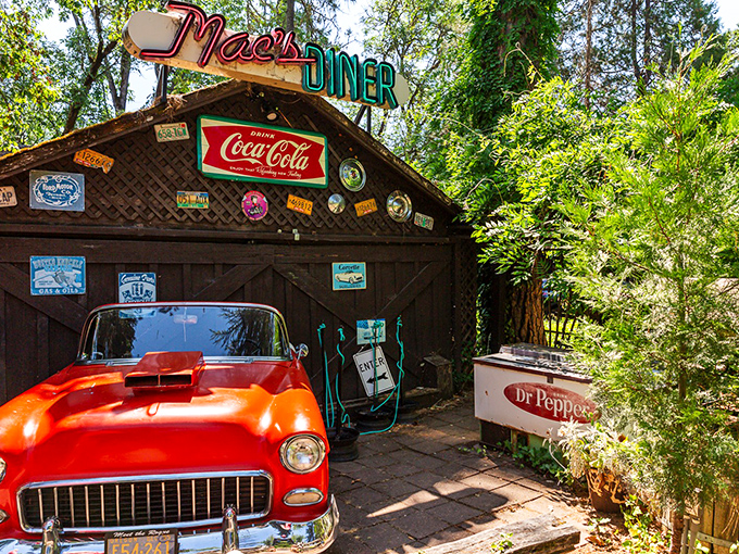 The entrance to Mac's beckons like a woodland fairy tale—rustic charm with an "ENTRANCE" sign that leaves no room for confusion.