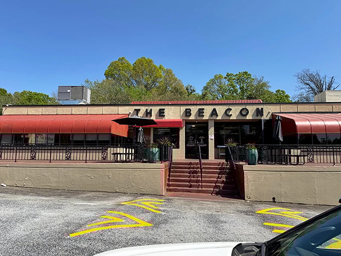 The iconic red steps leading to The Beacon aren't just an entrance—they're a gateway to burger paradise that's been welcoming hungry South Carolinians for generations.