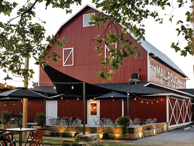 The iconic red barn exterior isn't just Instagram-worthy—it's a beacon of hope for hungry travelers seeking refuge from chain restaurant mediocrity.