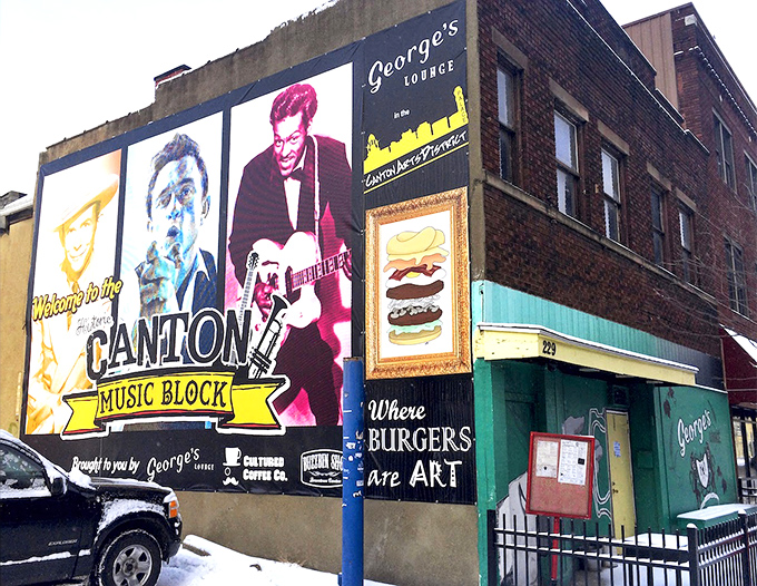 The mural-adorned exterior of George's Lounge boldly proclaims "Where BURGERS Are ART" – a promise they deliver on with mouthwatering precision.