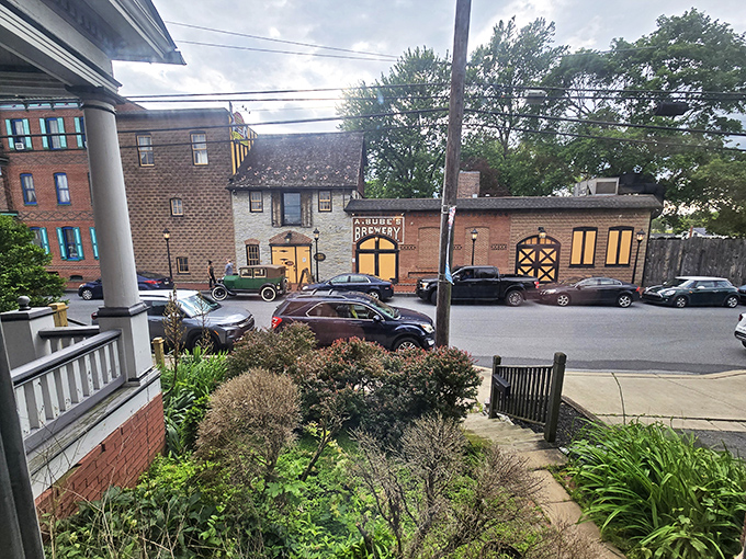 The historic façade of Bube's Brewery stands proudly on Mount Joy's main street, its yellow doors beckoning like a time portal to Pennsylvania's brewing past.