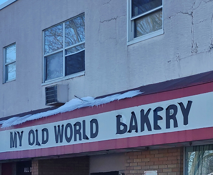 The unassuming storefront of My Old World Bakery stands as a testament to the adage that books shouldn't be judged by their covers—especially when those covers contain donuts.