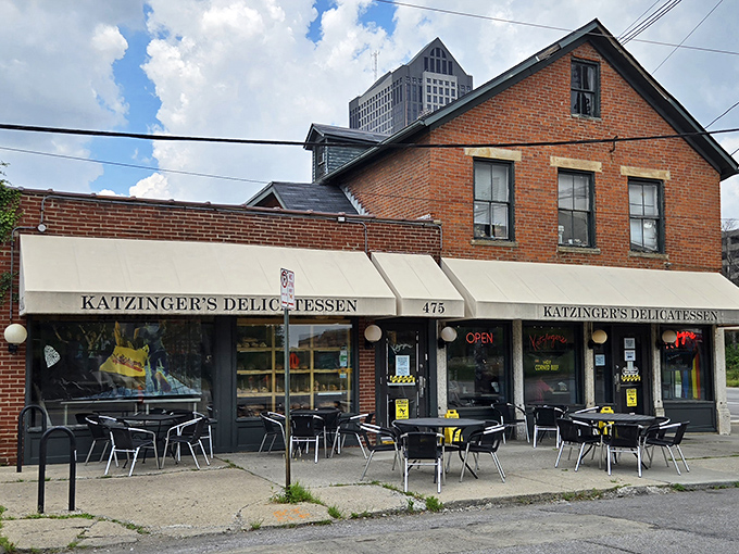 The brick facade and classic awning of Katzinger's isn't just inviting—it's practically a beacon for sandwich enthusiasts seeking deli nirvana in Columbus.