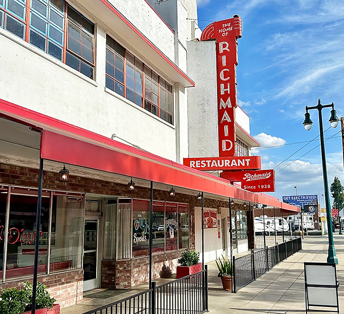 That iconic red neon sign against Lodi's blue sky isn't just advertising – it's a beacon of hope for hungry travelers seeking authentic diner magic.