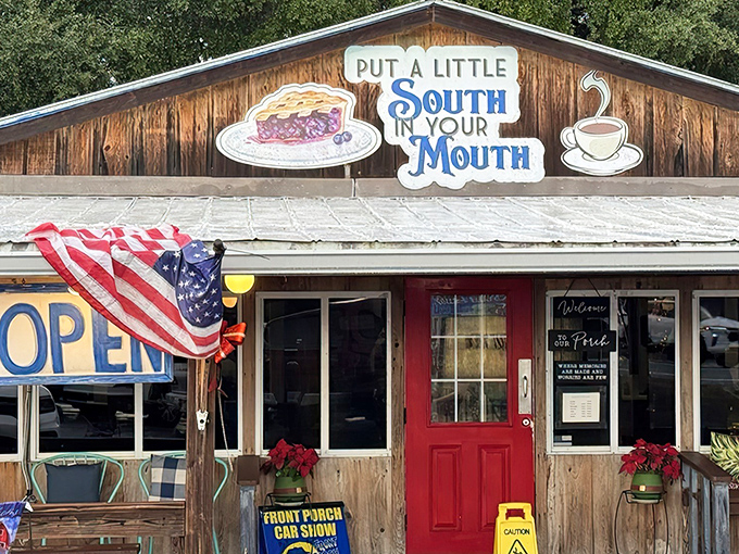 The promise of Southern comfort beckons from this rustic wooden facade. That red door isn't just an entrance—it's a portal to flavor country.