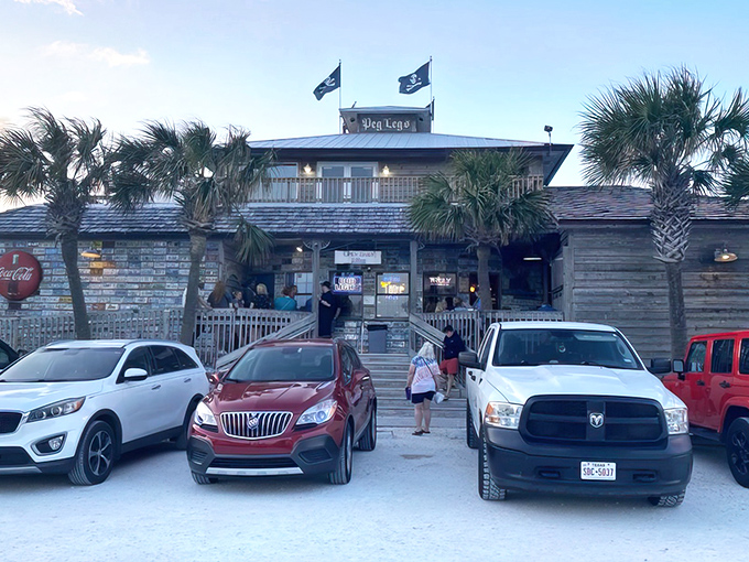 The stairway to seafood heaven! Weathered wooden steps and pirate flags beckon hungry travelers to this Pensacola Beach treasure trove.