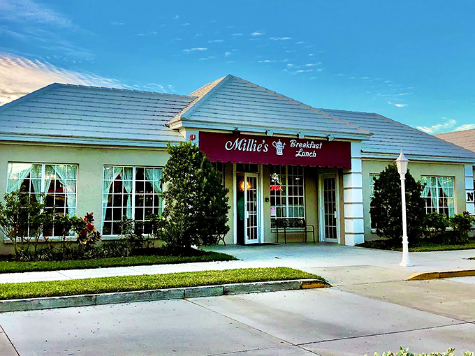 Millie's charming exterior promises little but delivers everything—a burgundy awning beckoning breakfast lovers like a culinary lighthouse on Sarasota's shore.