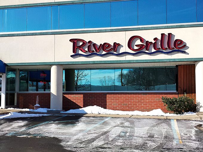 The blue awning beckons like a culinary lighthouse on Wilkes-Barre's dining scene. River Grille's exterior promises comfort with a dash of sophistication.