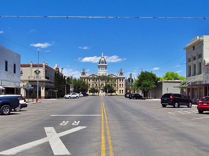 Downtown Marfa, where the historic Presidio County Courthouse stands like a Victorian sentinel watching over a town where time moves at its own delightful pace.