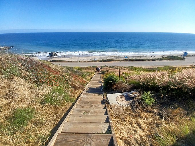 Wooden steps leading to paradise – where every descent brings you closer to that perfect California moment you've been dreaming about all week. 