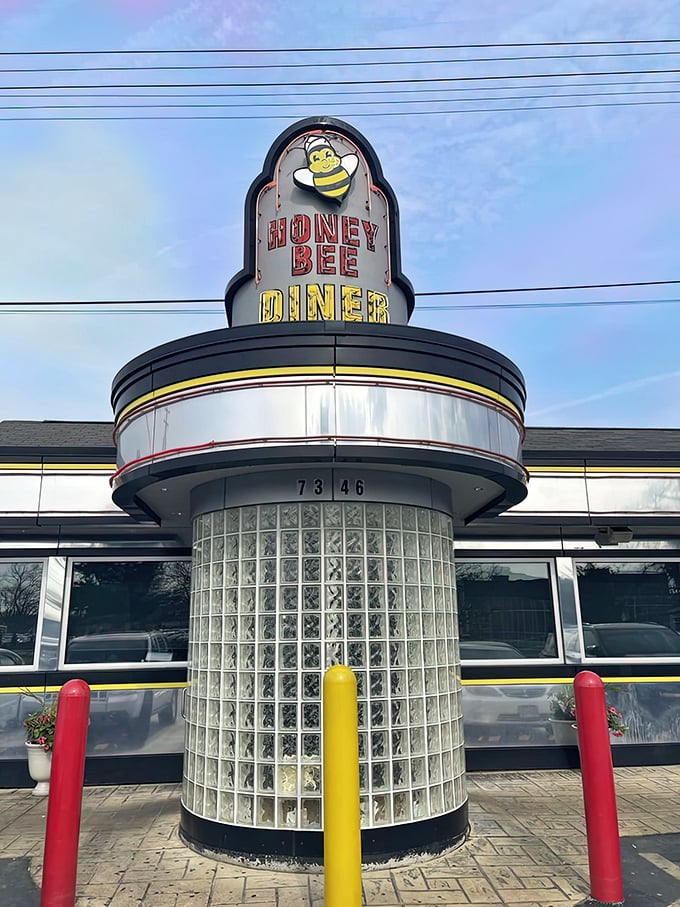 That iconic glass block tower isn't just architecture – it's a breakfast beacon calling hungry souls home.