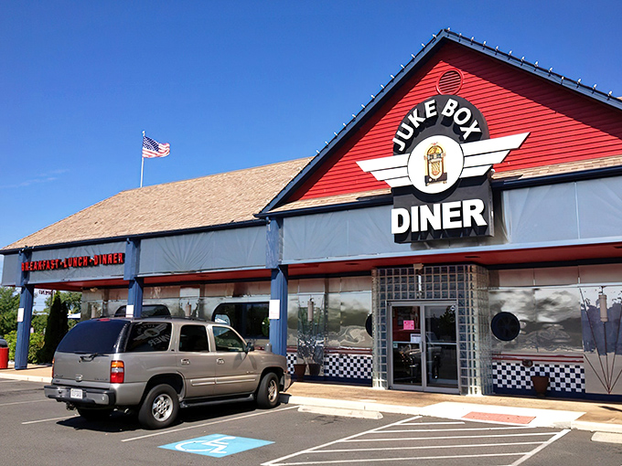 The bright red roof and iconic jukebox logo of Juke Box Diner stand out like a beacon for hungry travelers. This Manassas landmark promises a time-traveling culinary experience.