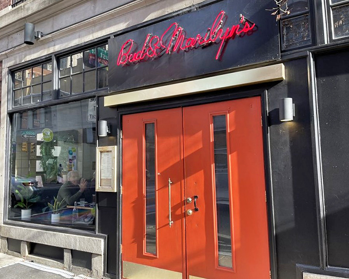 That neon glow isn't just lighting up Locust Street—it's a beacon calling all comfort food pilgrims to their next religious experience.