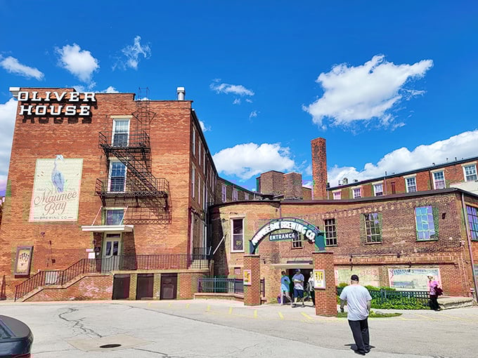 The iconic arched entrance beckons like a portal to beer paradise. Brick, history, and brewing excellence await beyond this Toledo landmark.