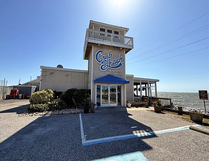 The watchtower-like structure isn't just for show—it's your lighthouse to seafood nirvana, perched right on the James River with views that rival the food.