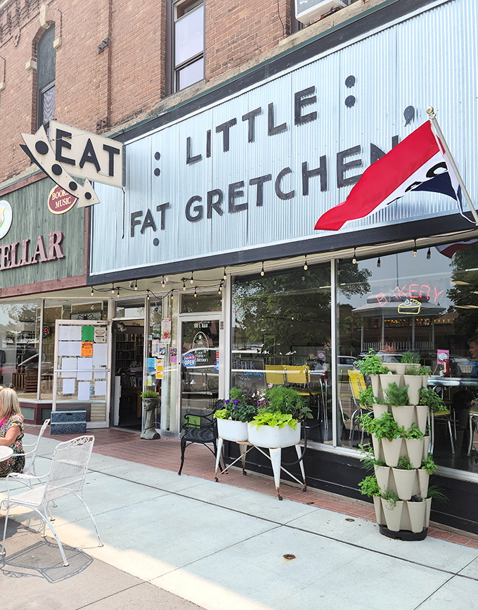 The iconic storefront beckons with its vintage charm and cheerful planters. That "EAT" sign isn't just a suggestion—it's practically a command.