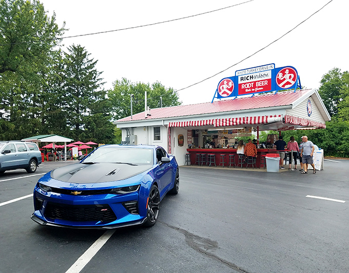 Time travel doesn't require a DeLorean—just a drive to this classic red-and-white awning where Richardson Root Beer and summer memories flow freely.