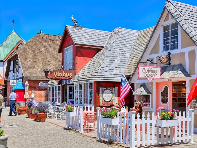 Windmills and Danish architecture against California mountains—like someone dropped Copenhagen into wine country and added perfect weather.