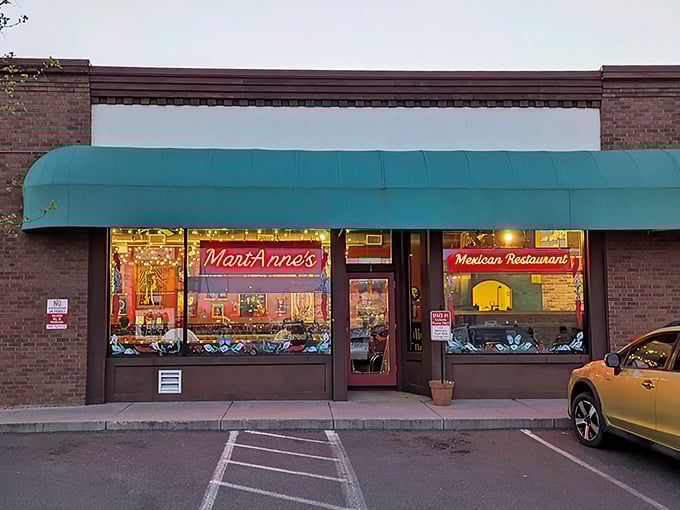 That turquoise awning beckons like a beacon of burrito bliss in downtown Flagstaff's charming streetscape.
