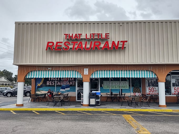 The red lettering against beige siding might not scream "culinary destination," but trust me—this unassuming strip mall facade hides breakfast treasures worth waking up for.