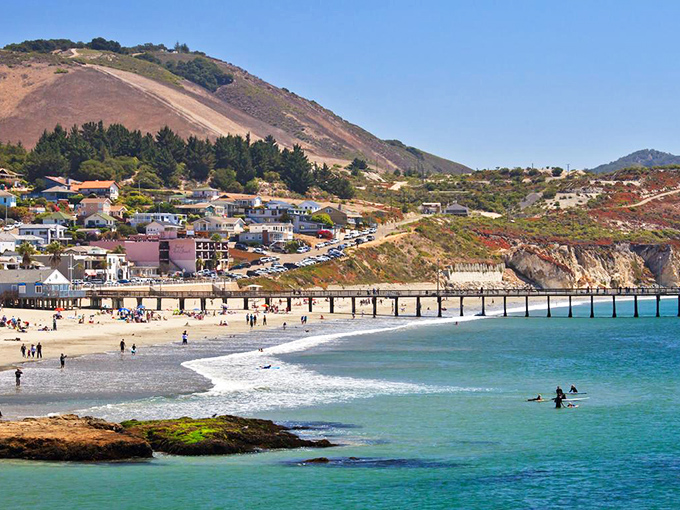 Aerial dreams come true: Avila Beach unfolds like a perfect postcard, with its golden crescent shoreline and that impossibly blue Pacific stretching to the horizon.