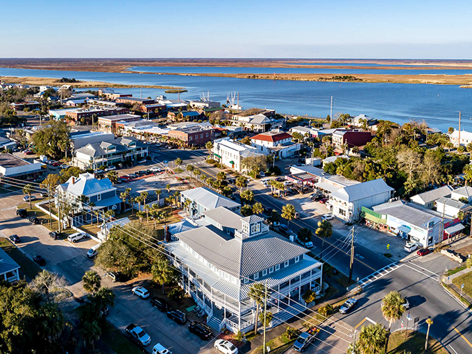 Apalachicola's waterfront whispers tales of maritime heritage while modern life hums along its shores—a perfect harmony of past and present.