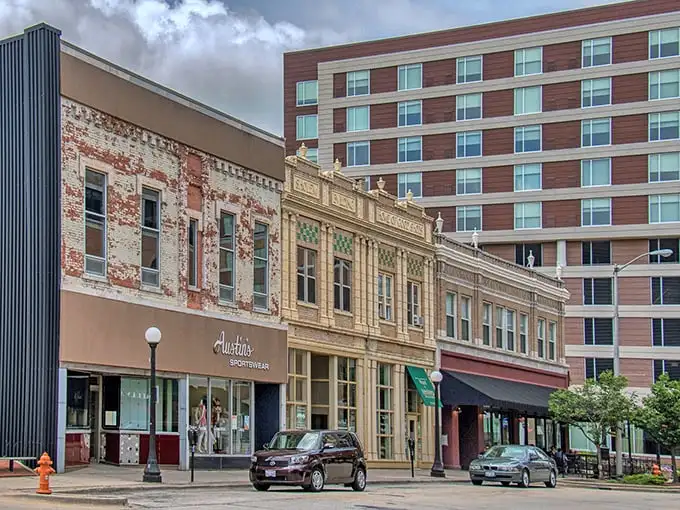 Downtown Champaign's architectural time machine – where weathered brick meets modern glass, and history whispers from every storefront.