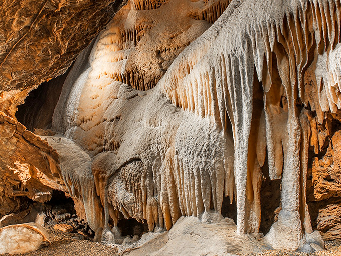 Nature's patient artistry on display: These delicate flowstone formations took thousands of years to create, each drip adding another microscopic layer to the masterpiece.