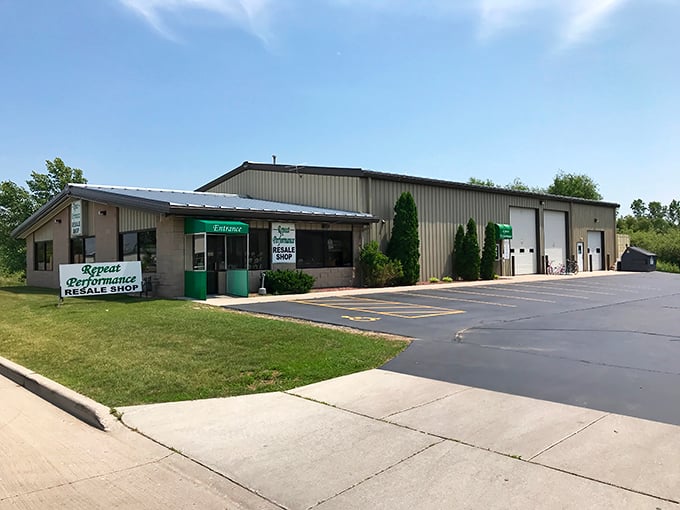 The unassuming exterior of Repeat Performance belies the treasure trove within—like finding a secret portal to bargain heaven in Manitowoc.