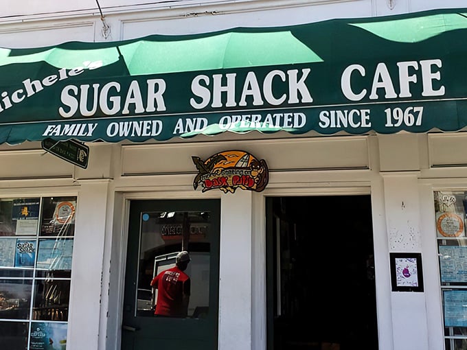 The iconic teal awning of Sugar Shack Cafe welcomes hungry beachgoers with the promise of comfort food and ocean breezes. A California classic hiding in plain sight.