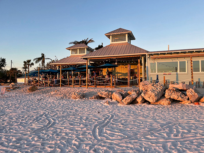 Paradise isn't just a state of mind—it's a beachfront restaurant with toes-in-the-sand dining and a sunset view that makes even the grumpiest snowbird smile.