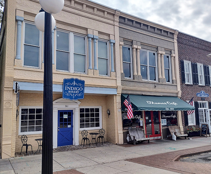 The iconic green awning of Thomas Café has been welcoming hungry Georgetown visitors since 1933. Small-town charm with big-time flavor awaits behind that red door.