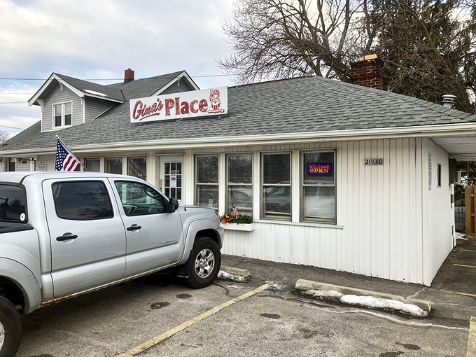 The unassuming white exterior of Gina's Place might fool you, but locals know better—this modest diner houses breakfast magic worth the morning pilgrimage.