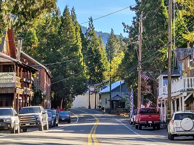 Main Street Sierra City looks like a movie set where Westerns meet Hallmark holiday films – complete with towering pines and mountains that refuse to be just background characters.