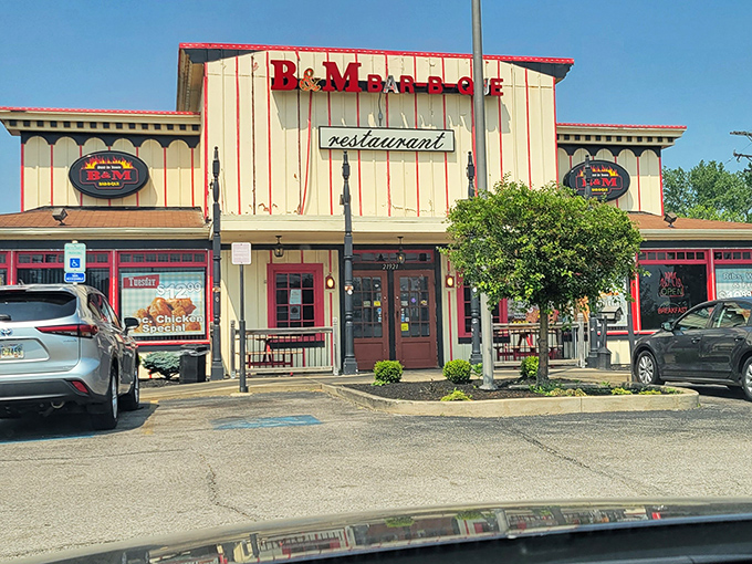 This unassuming facade holds secrets that would make barbecue legends weep with joy and envy.
