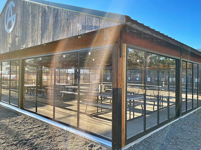 This weathered barn exterior hides Pennsylvania's best-kept barbecue secret, where smoke signals spell pure deliciousness.