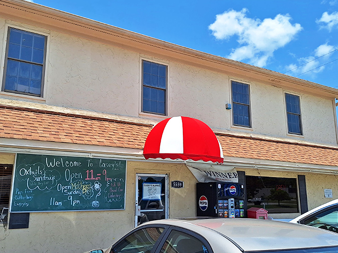 The unassuming exterior of Casey's Buffet & BBQ – where culinary magic happens behind a modest façade. Southern food paradise awaits inside!