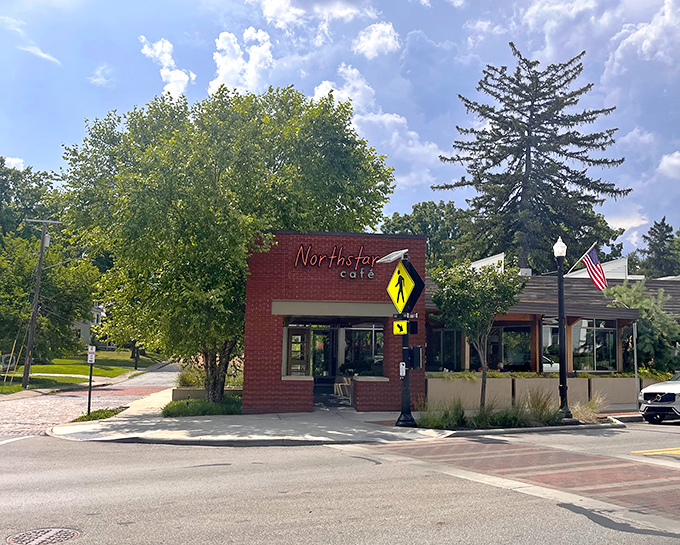 Nestled on a corner in Uptown Westerville, Northstar Café's brick exterior promises culinary delights within. The American flag adds a touch of hometown charm.