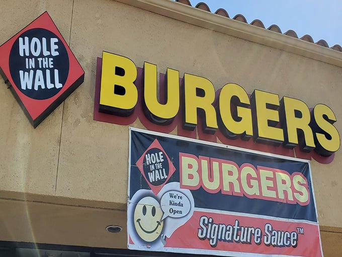 The unassuming storefront that houses burger greatness. Like finding a diamond in a strip mall, Hole in the Wall Burger's exterior promises simple pleasures done right.