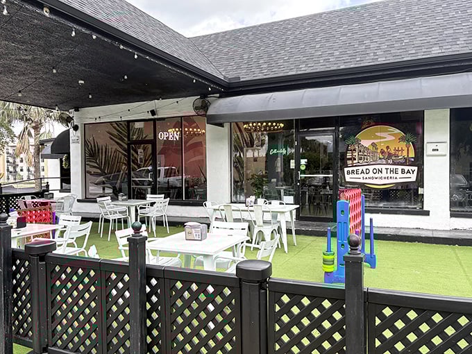 The patio at Bread On The Bay feels like Florida's answer to European café culture—artificial turf included! Connect Four tournaments optional but highly recommended.