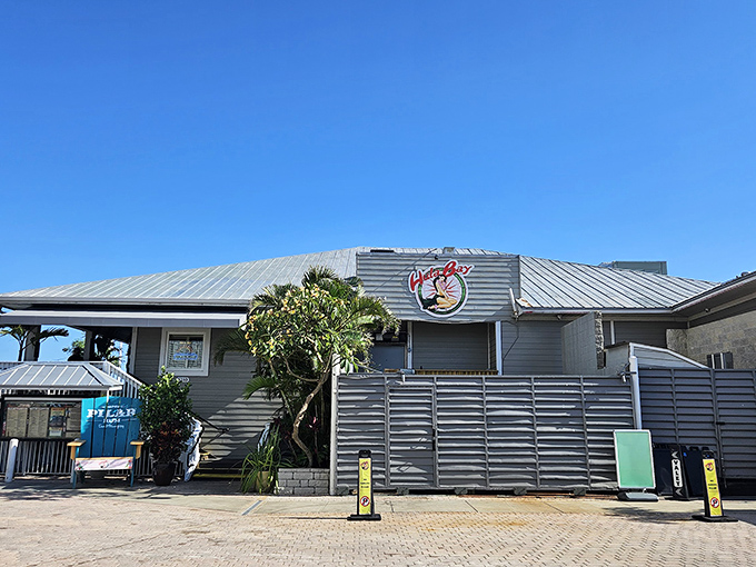 The unassuming exterior of Hula Bay Club is Florida's version of a speakeasy—the best culinary treasures often hide behind modest facades.
