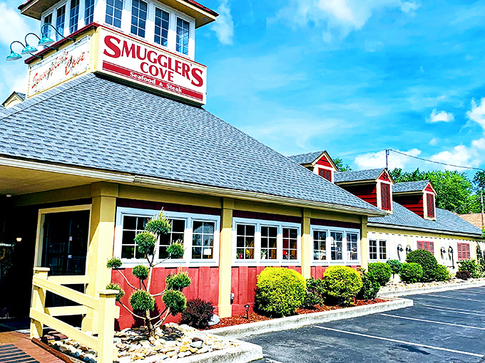The unassuming exterior of Smuggler's Cove belies the seafood treasures within. That lighthouse-inspired tower isn't just for show—it's guiding hungry travelers home.