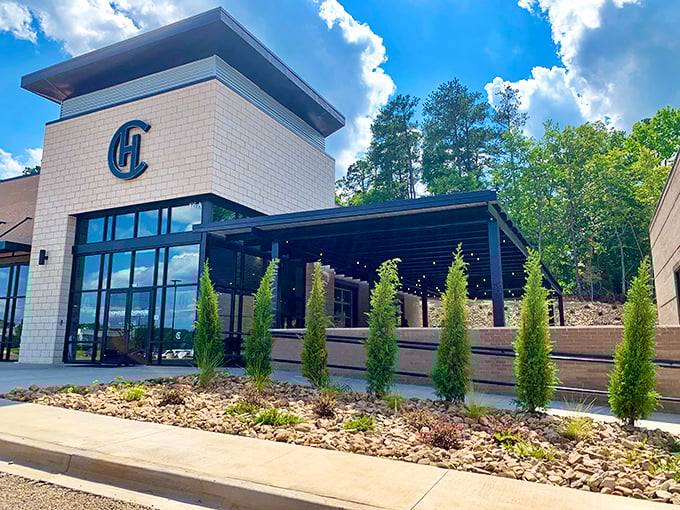 Modern elegance meets small-town charm at Chophouse of Chapin's striking exterior. The sleek design and signature "CH" logo promise culinary adventures await inside.