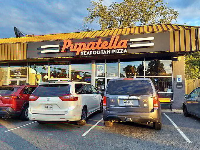 The bright yellow awning beckons like a pizza lighthouse on Wilson Boulevard. No fancy frills needed when what's inside is this good. 